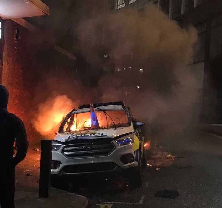UK protest, Police car on fire (provided by Elsie King) - Youth ...